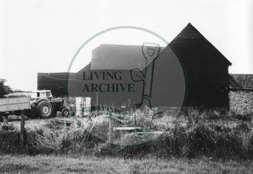 Photograph of farm building and tractor at Woolstone (1971). - Living ...