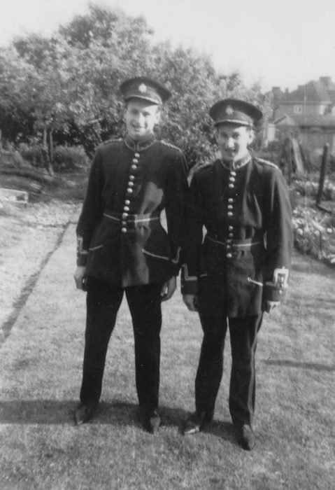 Bradwell Silver Band members in uniform in back garden. - Living Archive