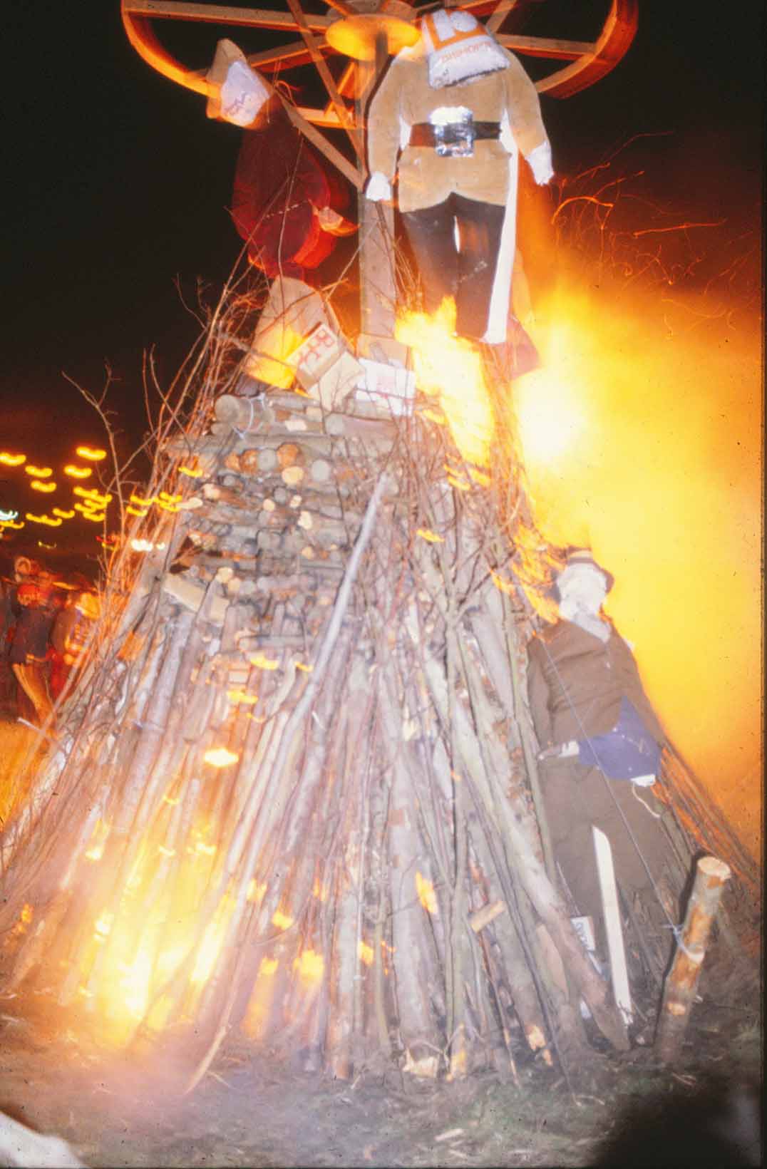 A bonfire with several effigies on - Living Archive