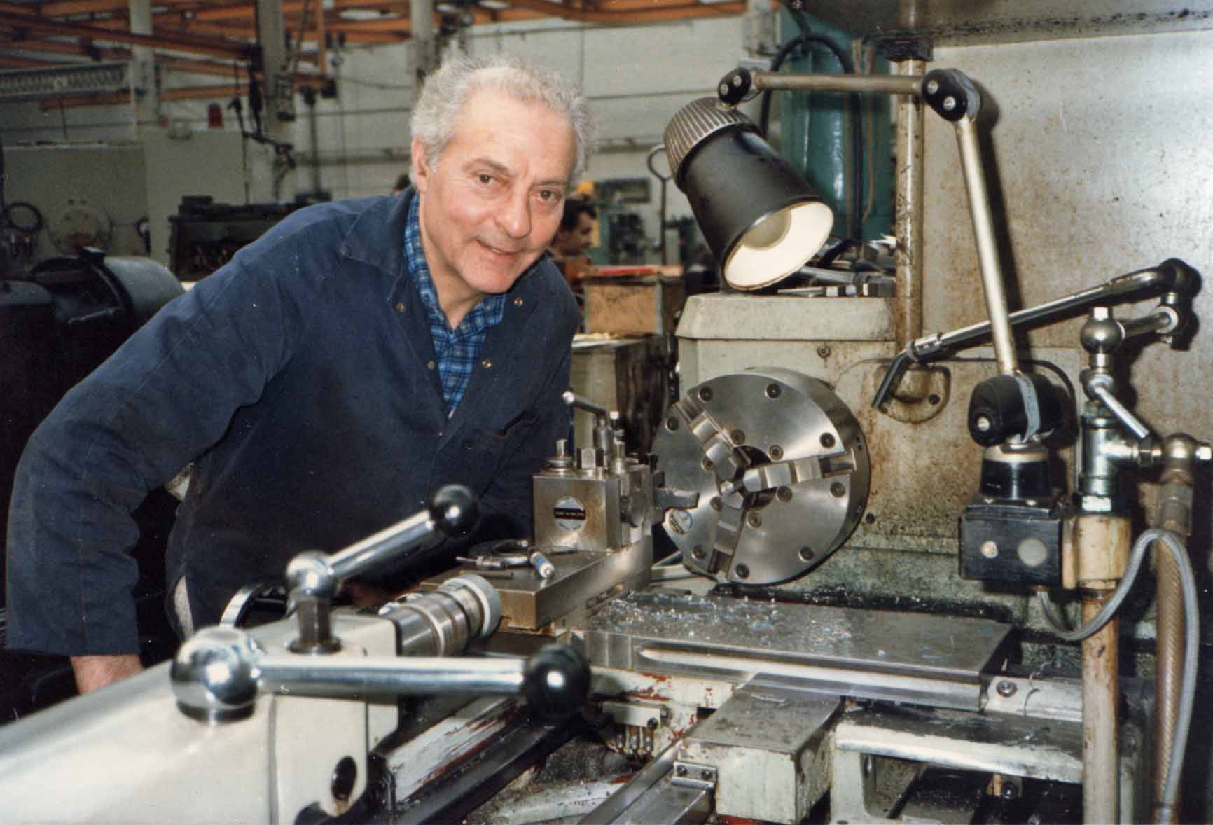 Chargehand Turner Doug Nichols at a lathe in the Toolroom - Living Archive