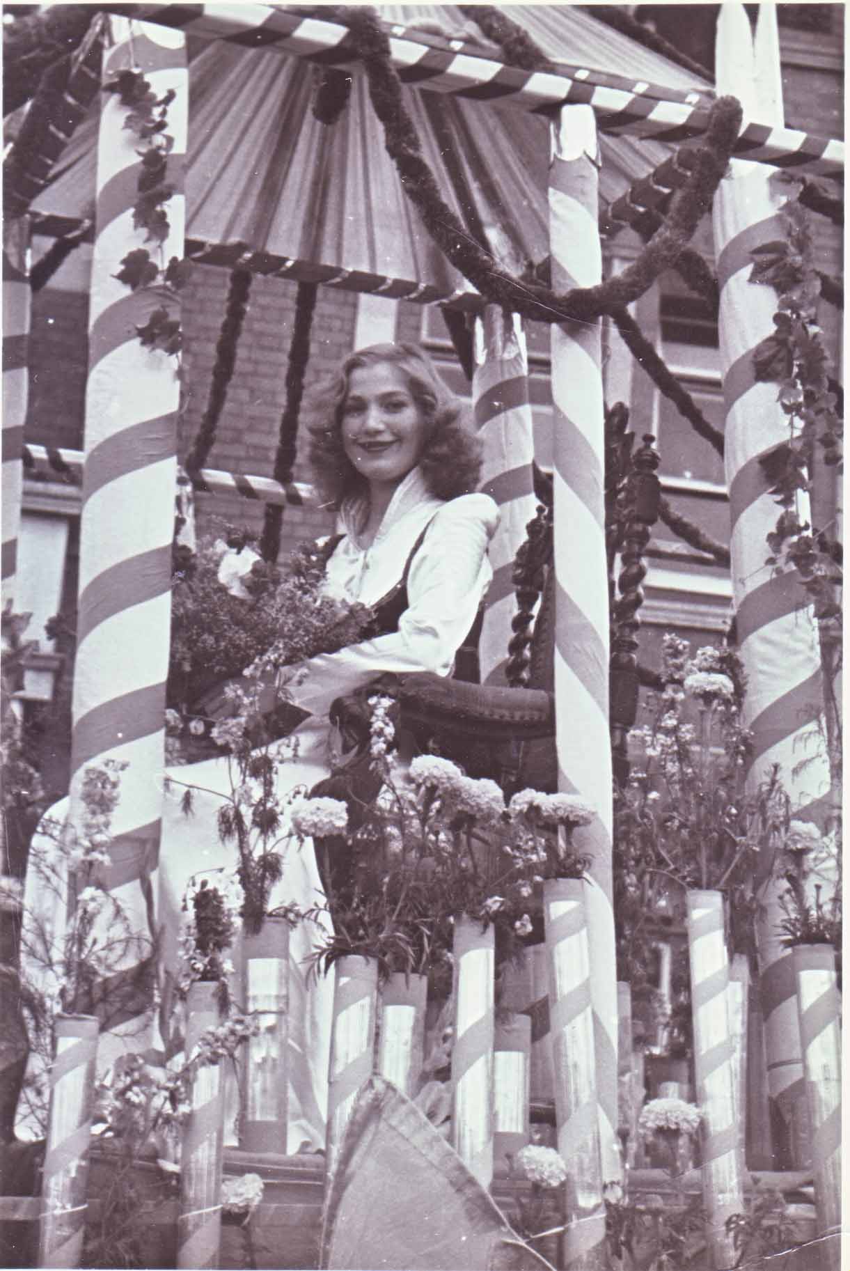 Lady seated on carnival float - Living Archive