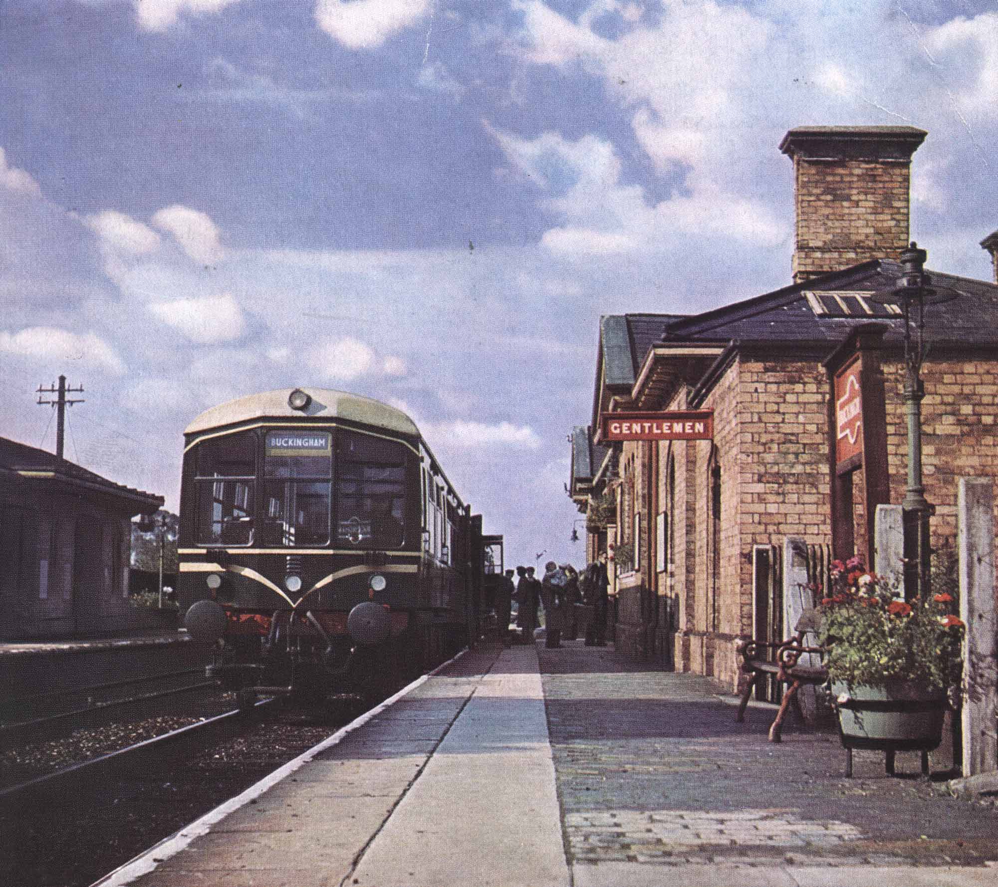 The Gleaming Olive Green Railcar at Buckingham Station - Living Archive